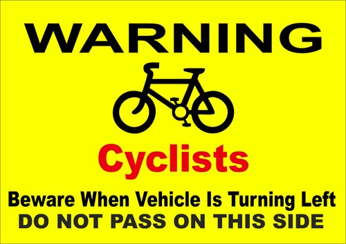 CYCLISTS BEWARE WHEN VEHICLE TURNING LEFT DO NOT PASS warning sign or ...