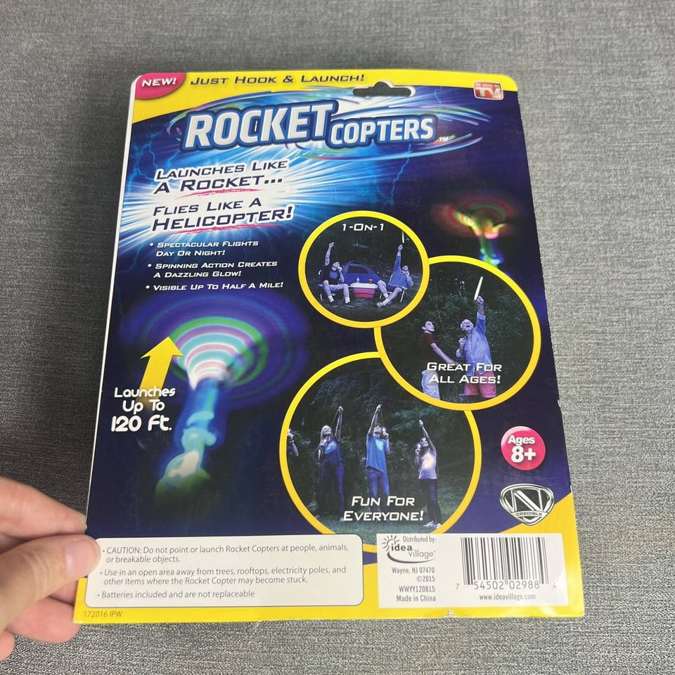 NEW SEALED 9-Piece LED ROCKET COPTERS Slingshot LED Helicopter Fun ...