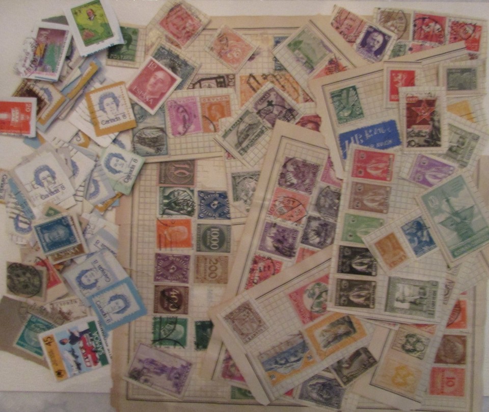 5 pounds of Worldwide stamps Box lot hoard on paper box filled to the ...