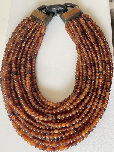 xcellent Gerda Lynggaard Monies 18-Strand Amber Horn Beaded Necklace 17 ...