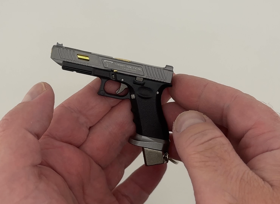 Die Cast Taran Tactical Combat Master Toy Gun Keychain Realistic Action ...