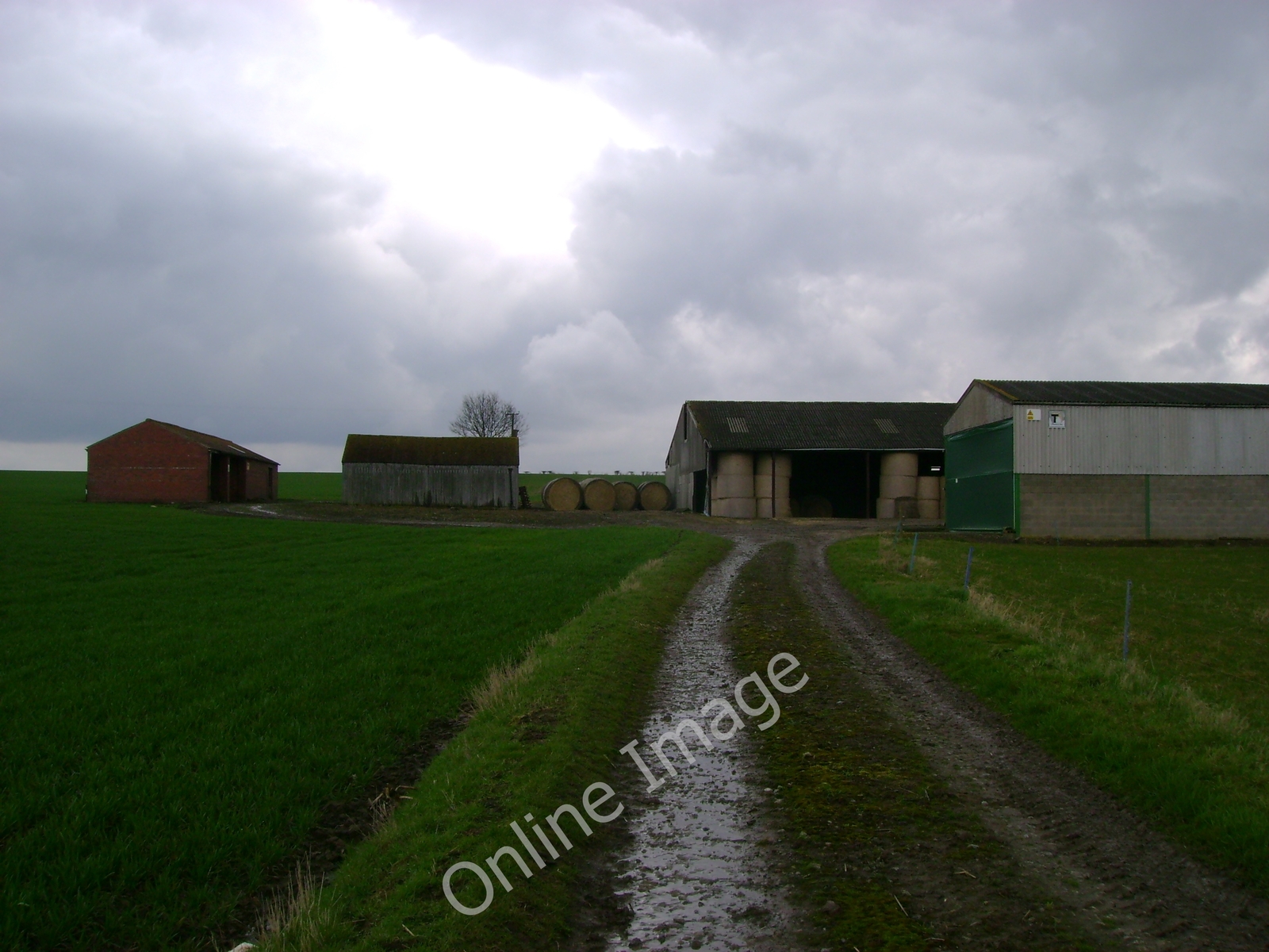 Photo 12x8 Barns by the Track Marton-in-the-Forest This track runs from ...