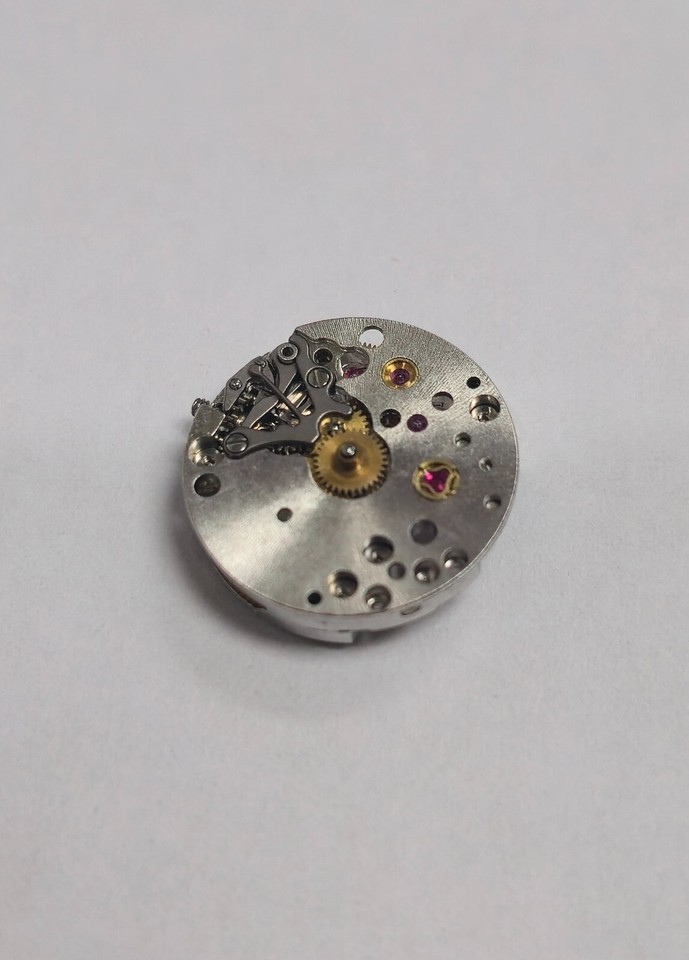 Rolex 1400 movement parts, movement, crown, dial, bridge, balance ...