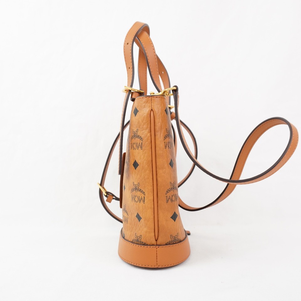 MCM Aren Canvas And Leather Bucket Tote Bag In Cognac Visetos Monogram ...