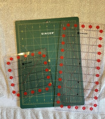 Set of Singer branded quilting rulers and cutting mat, with carrying ...