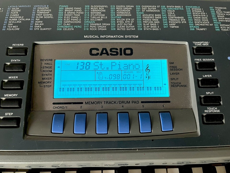 Casio WK 1200 keyboard. 76 Keys With Stand. Missing Cord, Runs On ...