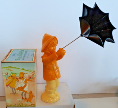 Avon cologne bottle Tug-A-'Brella boy with inside out umbrella...empty ...