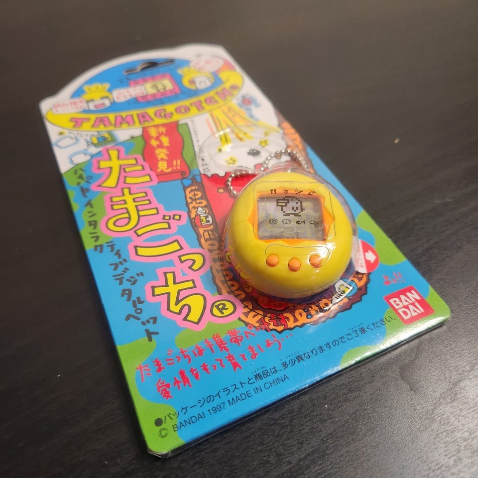 Tamagotchi Original 1st Generation Yellow with Orange Bandai - Brand ...