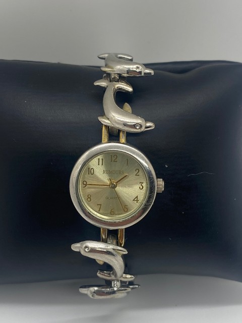 Rumours Dolphin Watch Women's Quartz Silver and Gold Tone Band Bracelet ...