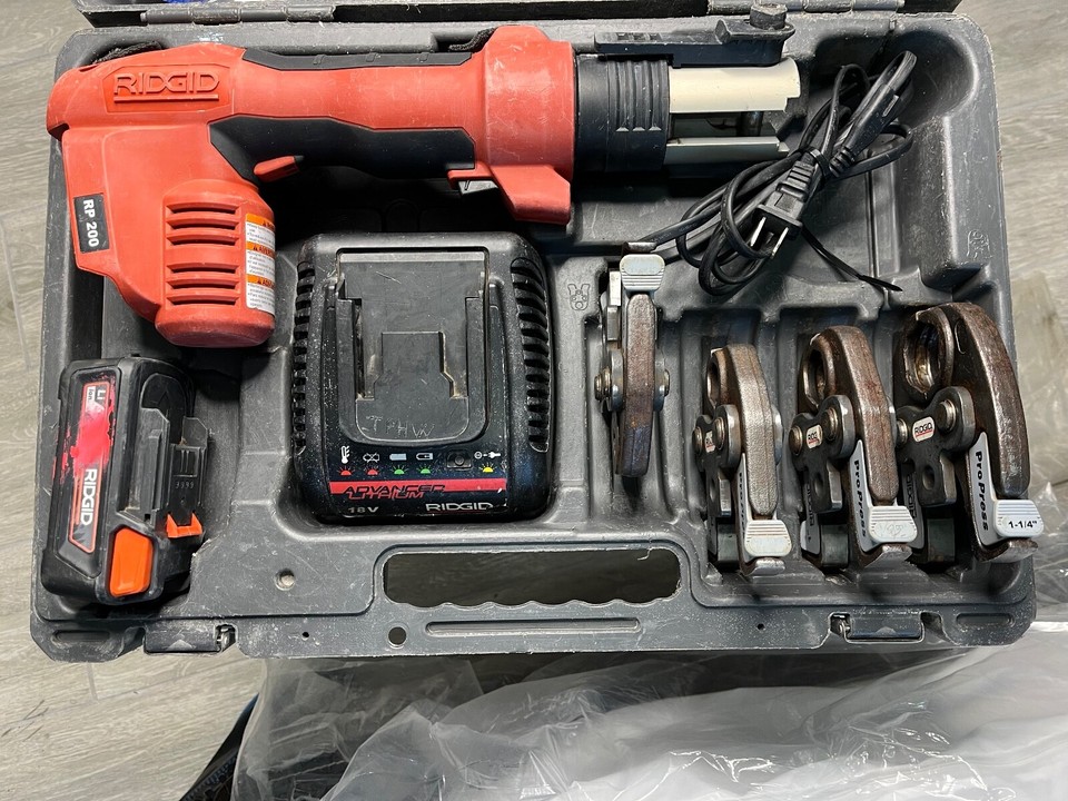 Ridgid RP 200-B Compact press tool 1 battery 1 charger 4 jaws, and the ...
