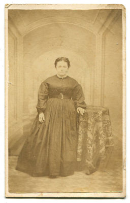 STURDY WOMAN, STANDING POSE AT FABRIC DRAPED TABLE. CDV. | eBay