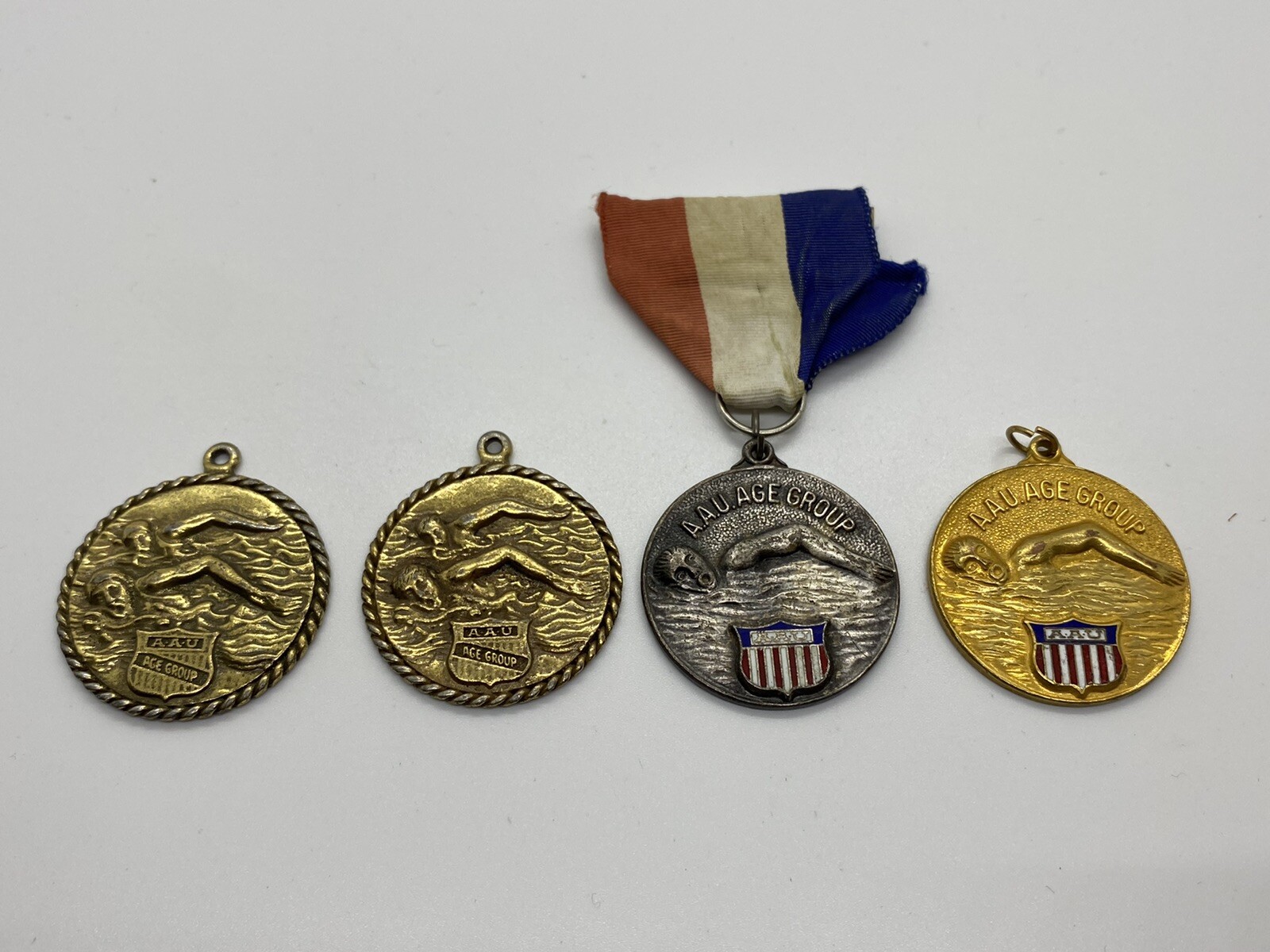 Lot of 4 Vintage AAU Age Group Swimming Medals Gold & Silver s7 | eBay