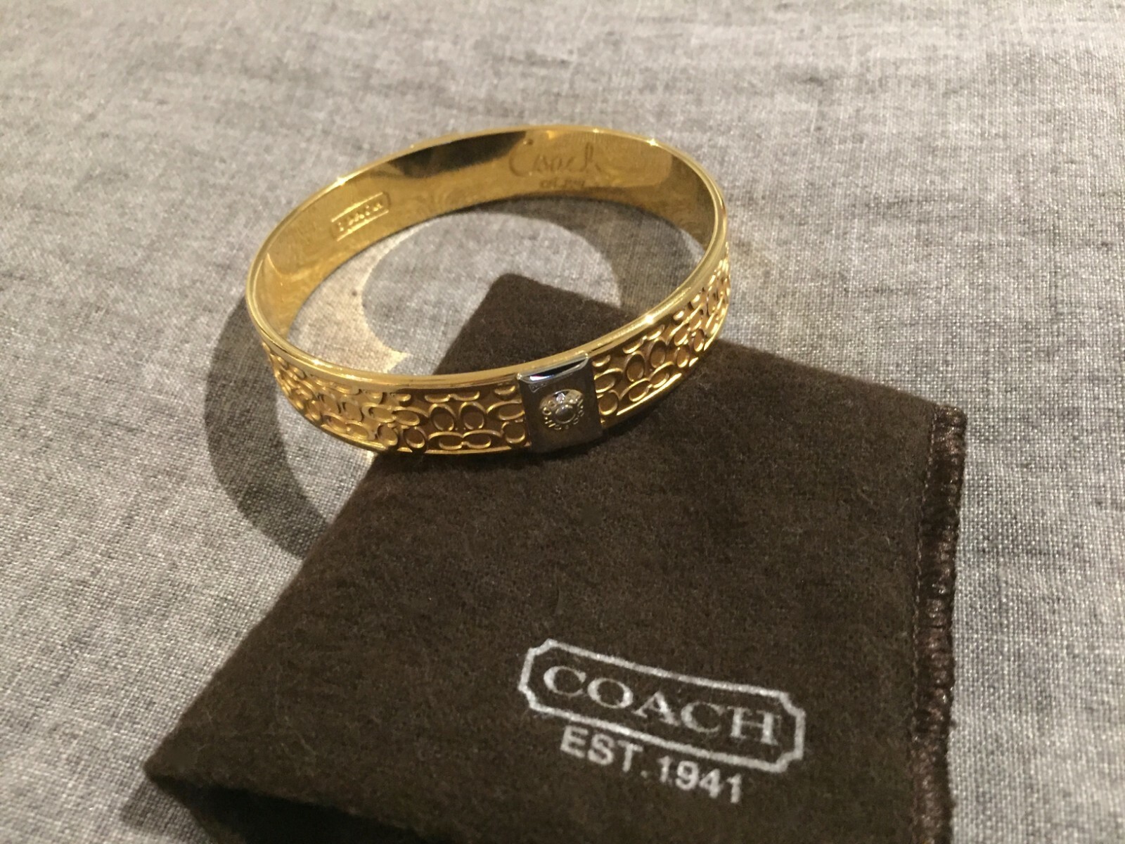 COACH Bangle Bracelet, GOLD TONE, Signature Embossed - Gem