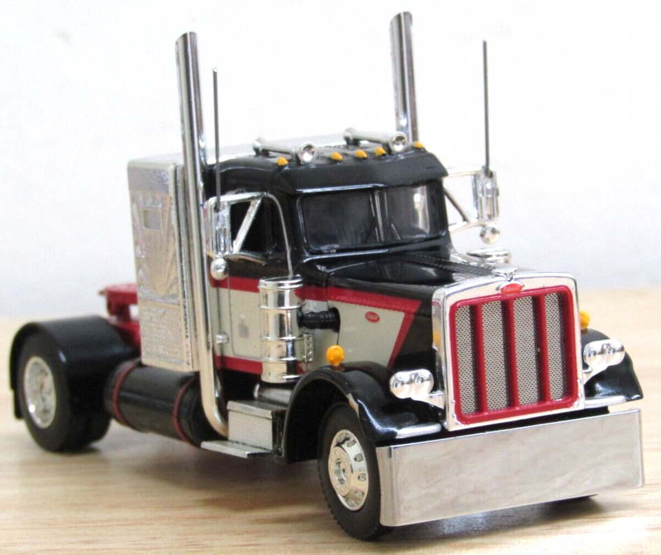 DCP Custom black/white Peterbilt 359 34" Mercury bunk single axle ...