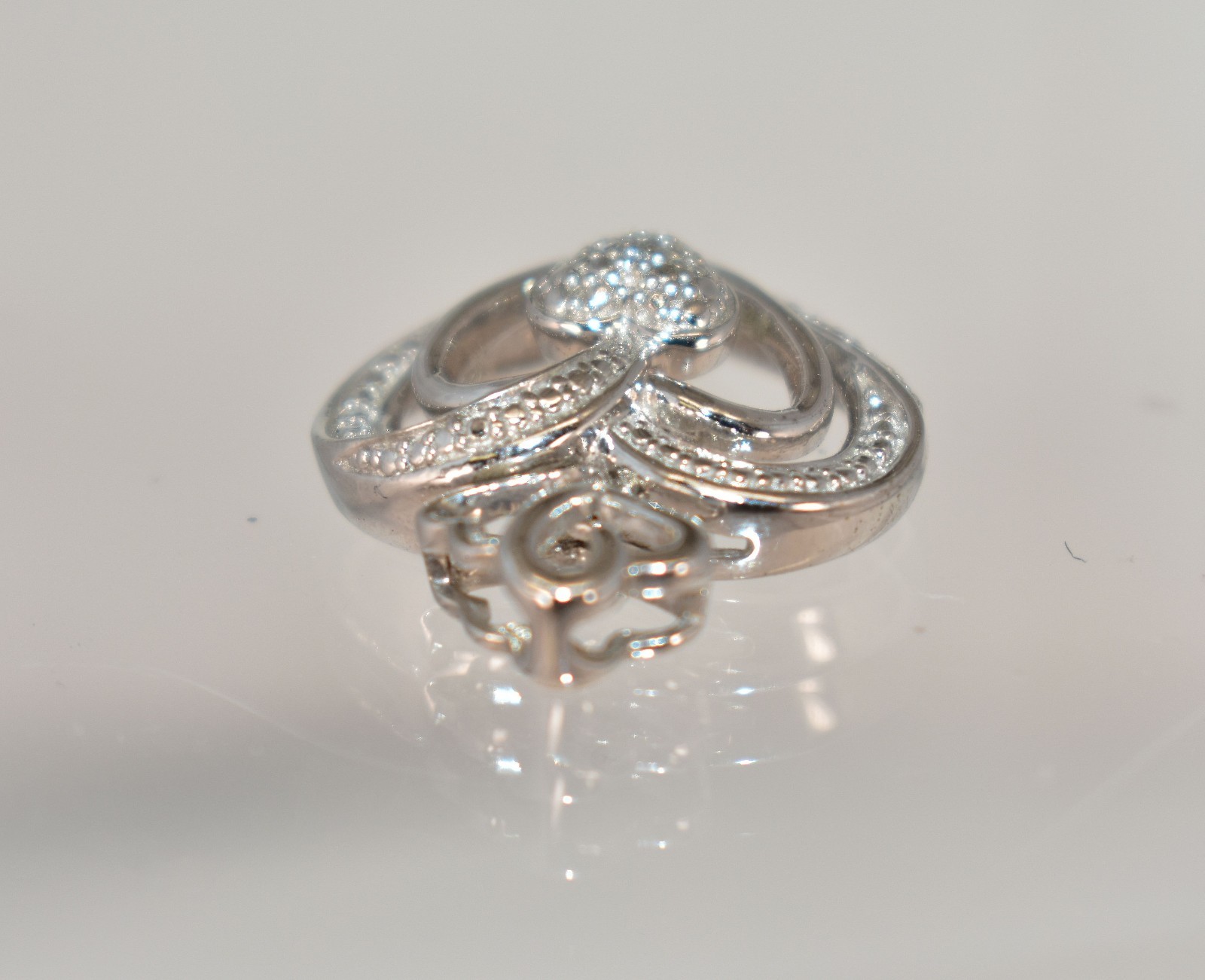 Sterling Silver .05 CT TCW White Diamond Accents Quintuple Heart ...