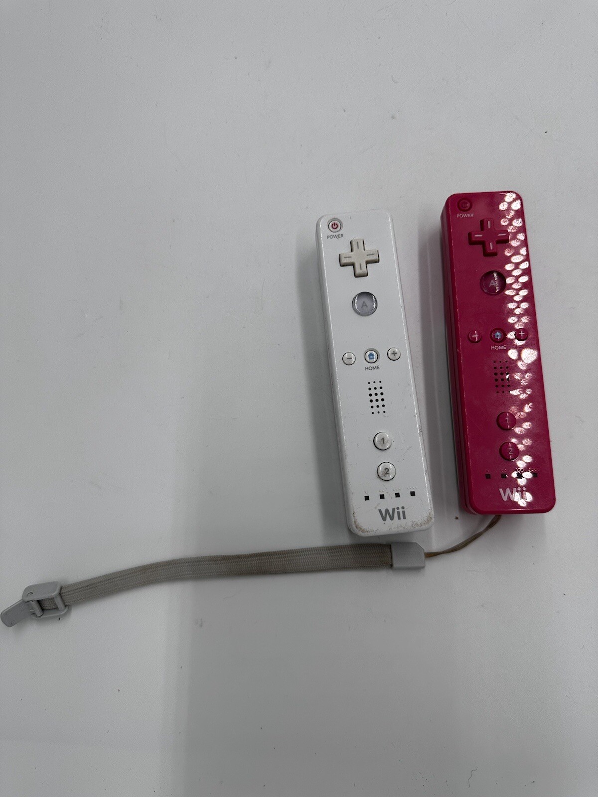 Lot Of Two Wii Remotes Pink And White One Missing Back Cover Nintendo ...