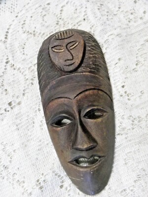 A Vintage, Wooden Hand-Carved wooden warrior mask 8" long 3 1/4" wide ...