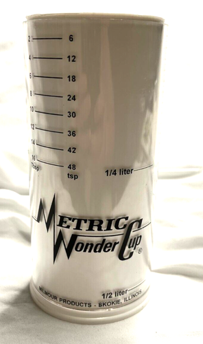 The METRIC WONDER CUP - Wet / dry Measure | eBay