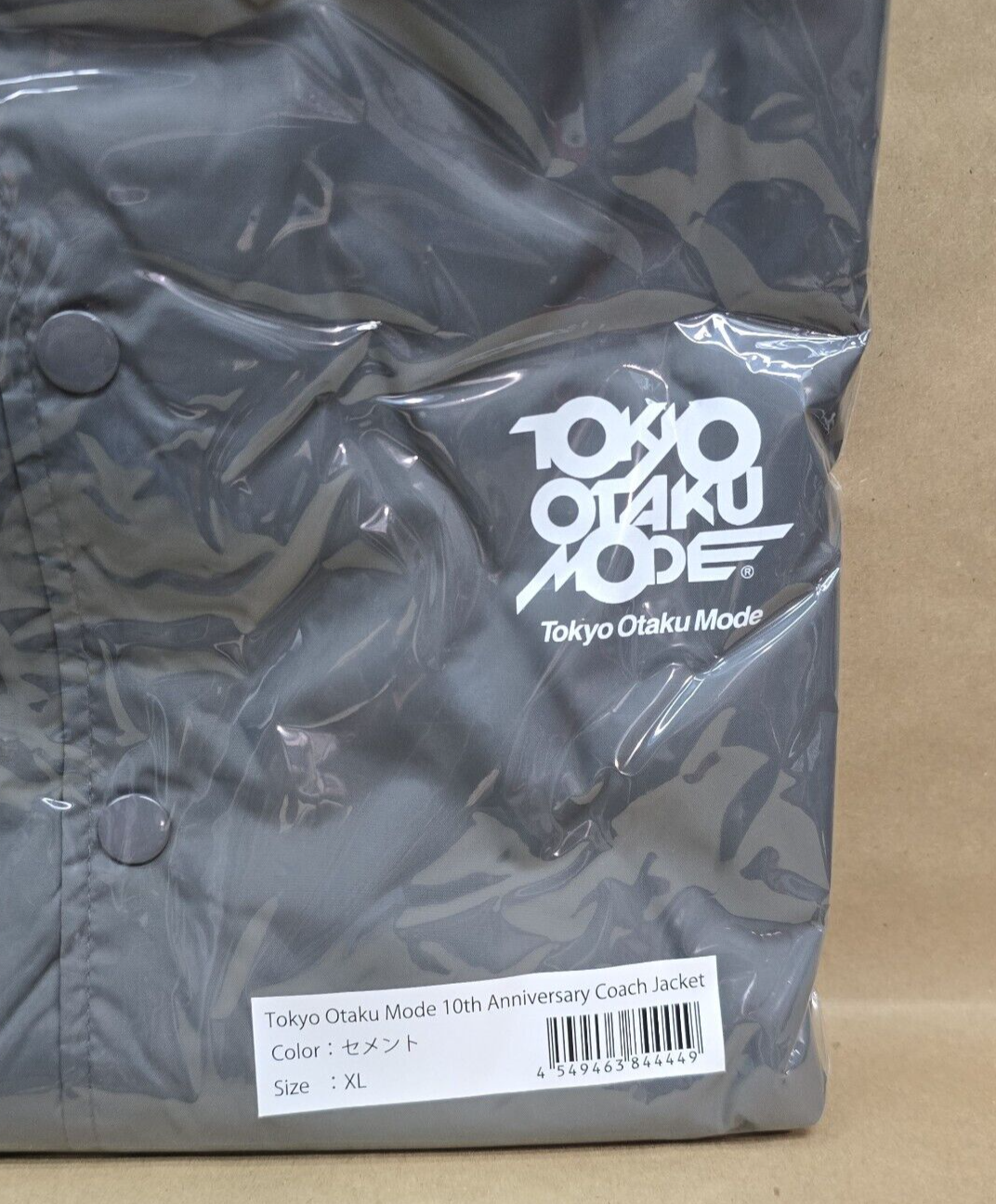 Tokyo Otaku Mode 10th Anniversary Nylon Coach Jacket, Gray, XL Size ...