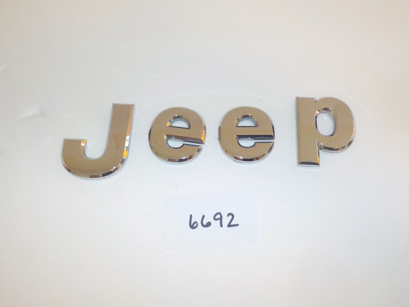 05-18 Jeep Hood Emblem Nameplate OEM 55157089AC (#6692) | eBay
