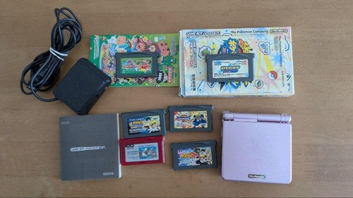 Nintendo Game Boy Advance SP console, charger, and cartridge set Super ...