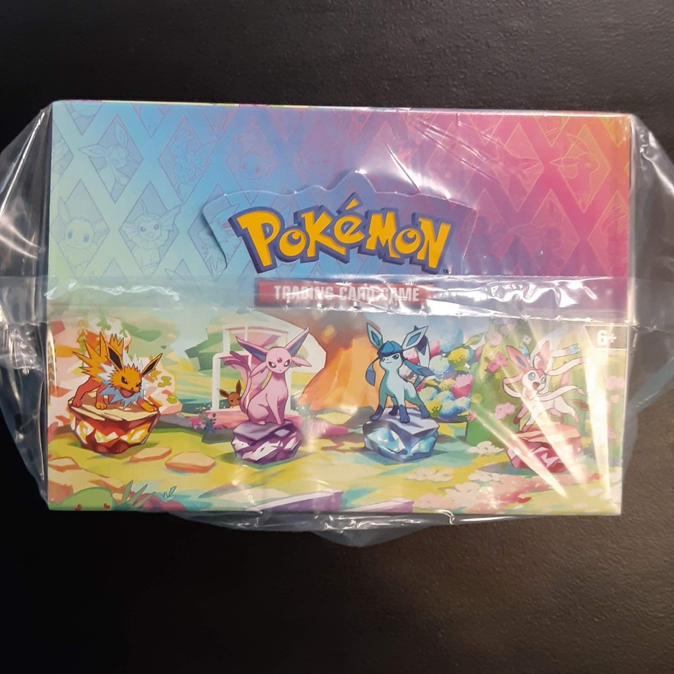 Pokemon Prismatic Evolutions Mini Tin Display Box with 8 sealed tins | eBay