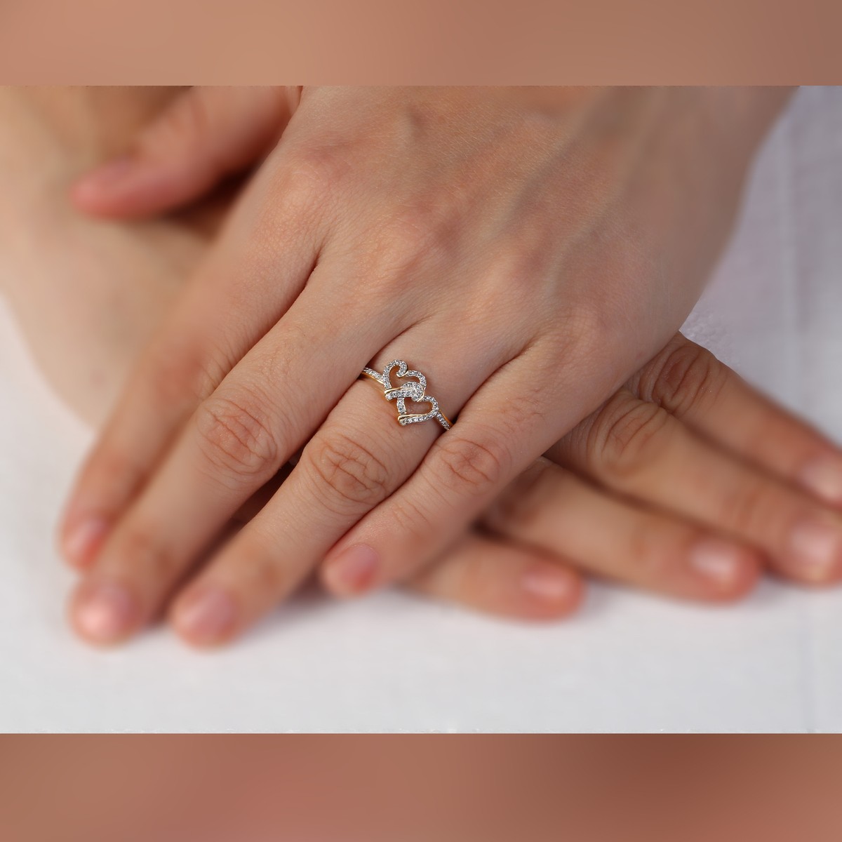10K Yellow Gold 0.12Ct TW Diamond Interlocked Hearts Fashion 10K Yellow Gold 0.12Ct TW Diamond Interlocked Hearts Fashion