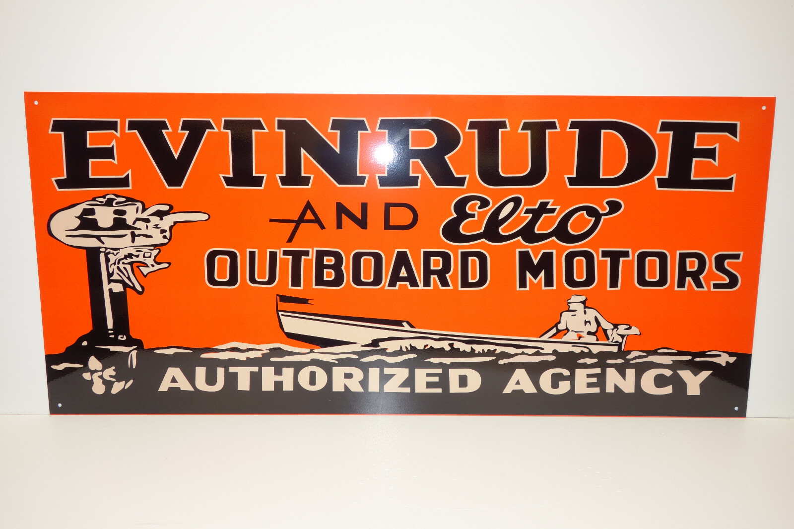 EVINRUDE AND ELTO MOTORS STEEL ENAMEL SIGN. 1/8" THICK 40" WIDE X 18 ...