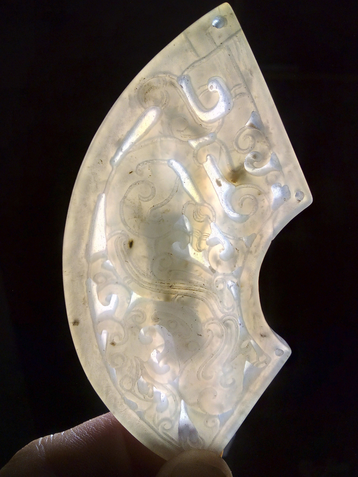 China 18./19. Jh. Qing - A Chinese Carved White Jade 'Huang' Pendant ...