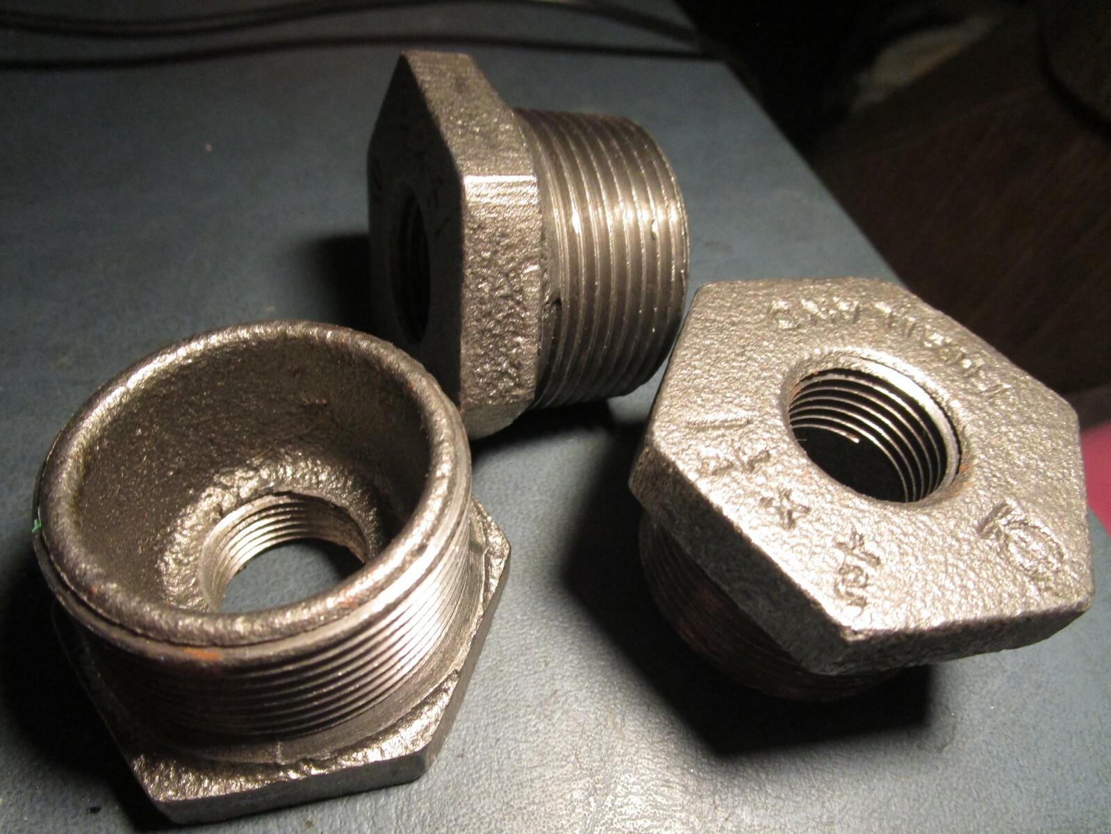 (3) 1-1/4" M-NPT x 1/2" F-NPT 150 lb Black Malleable Iron Hex Bushing ...