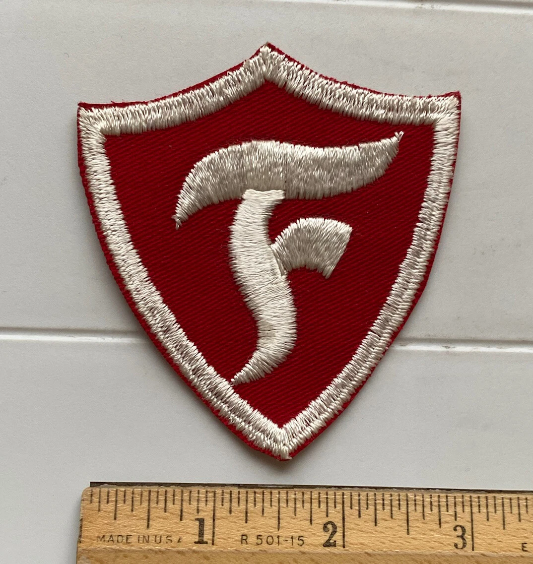 Red F Logo In Shield