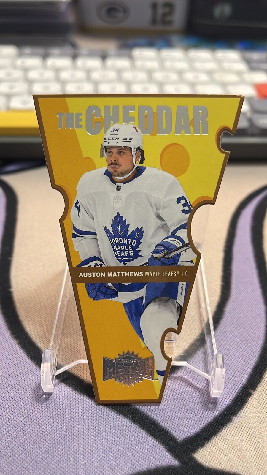 2021-22 Metal Universe NHL AUSTON MATTHEWS The Cheddar Die-Cut Base #20 ...