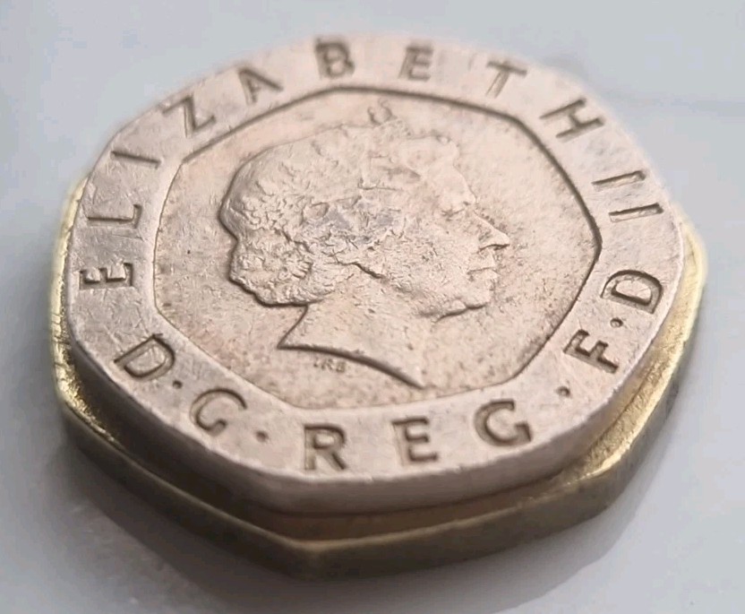 UNIDENTIFIED 7 SIDED BLANK PLANCHET COIN, SLIGHTLY LARGER & THICKER ...