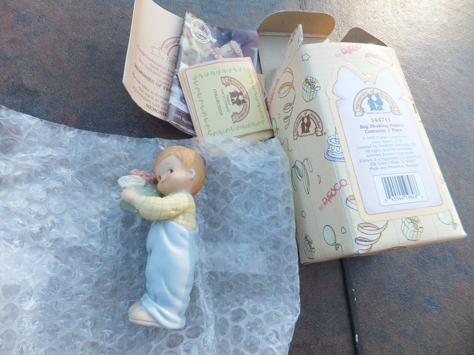 1995 Enesco Memories of Yesterday, Boy Shaking Present, 144711 | eBay