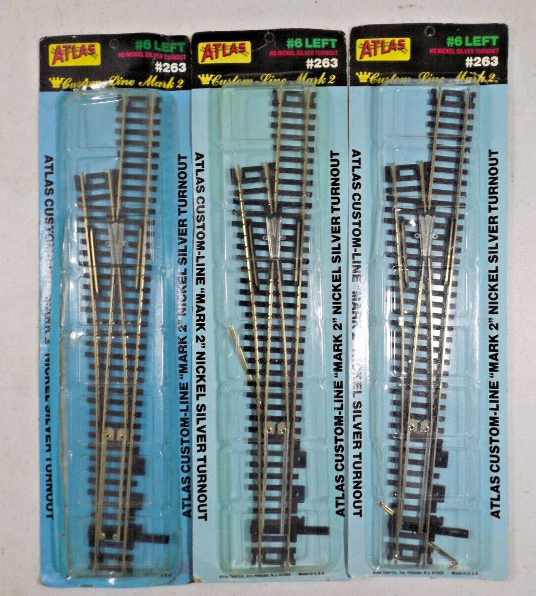 (3) HO Atlas #263 nickel silver left hand switches in orig packages ...