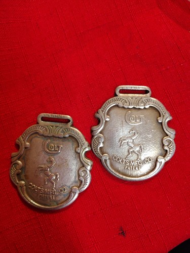 2 COLT FIRE ARMS & GUNS WATCH FOB COLTS MANUFACTURING CO. SILVER ...