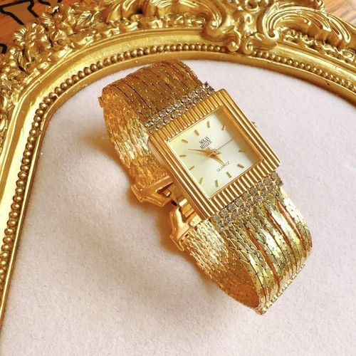 Nolan Miller Vintage Gold Band Quartz Watch working product | eBay
