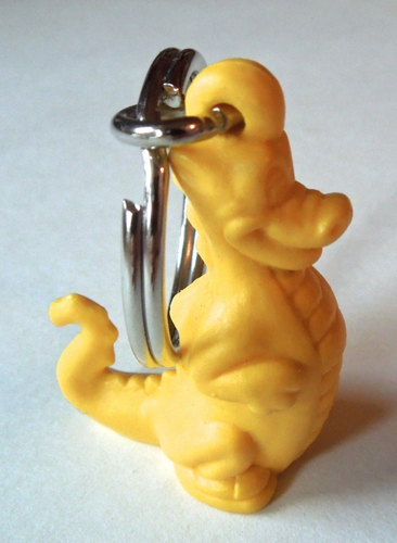 Tupperware Yellow Dinosaur Fun Flyer Keychain Douglass Dirtwalker ...