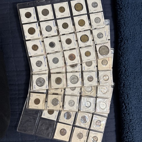 Lot Of 75 Assorted Foreign World Coins In Plastic Sheets | eBay