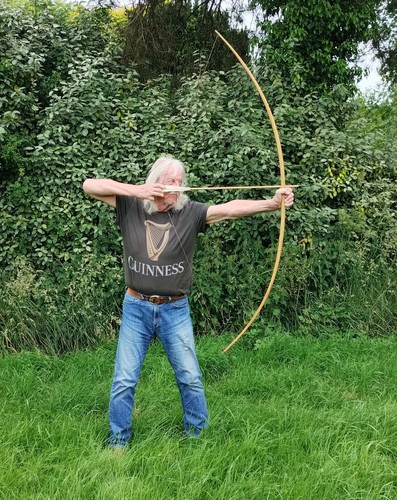 English Ash Longbow. Single piece of wood (self bow) with oiled finish ...