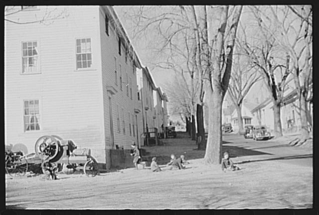 Children playing in the street in the mill town of Occum,Connecticut,CT ...