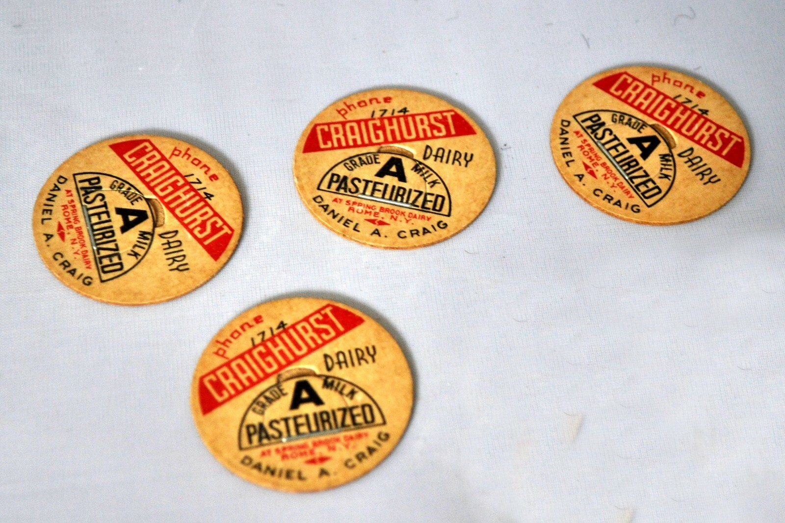 4 VINTAGE 1940S CARDBOARD MILK CAPS CRAIGHURST DAIRY ROME NY 1 3/8" EX ...