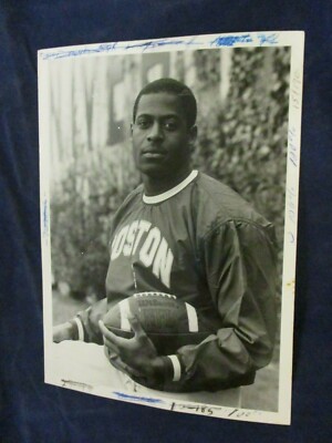 Vintage Boston University football player poses w/football Glossy Press ...