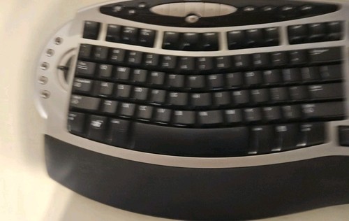 Microsoft 4000 Natural Ergonomic Keyboard with riser model number 1045 ...