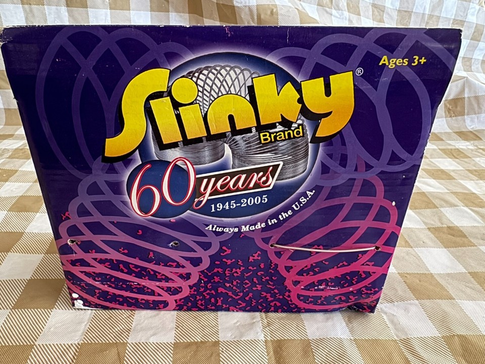 THE SLINKY: 1945~2005 60 YEAR COMMEMORATIVE COIN BANK LIMITED EDITION ...