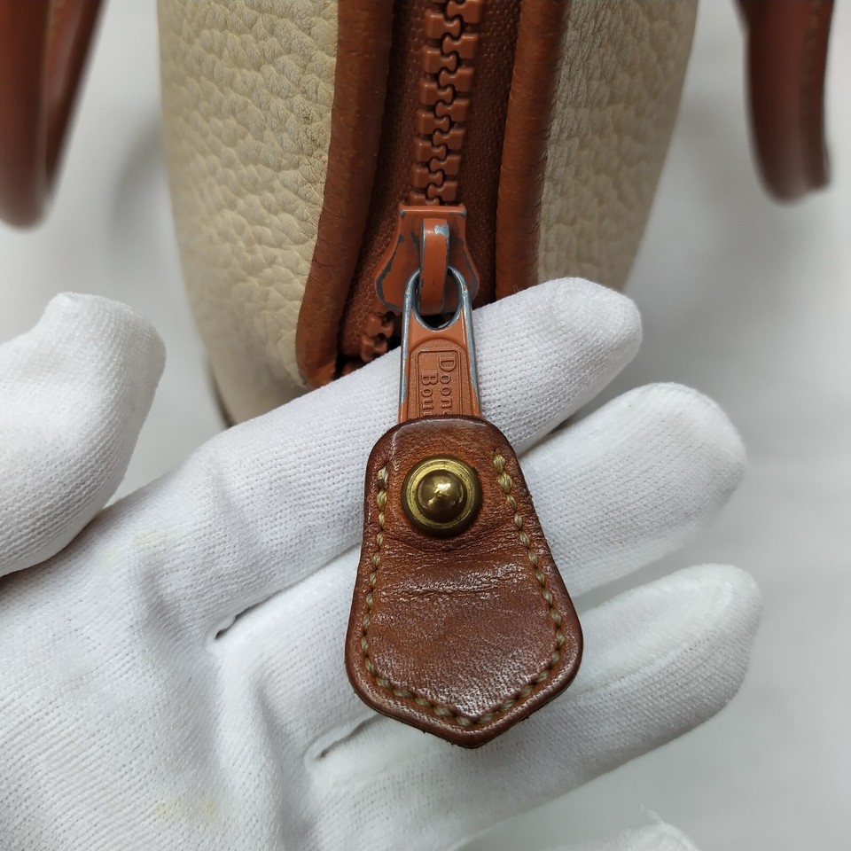 Dooney & Bourke Ivory Pebbled Leather Dommed Double Handle Zipper ...