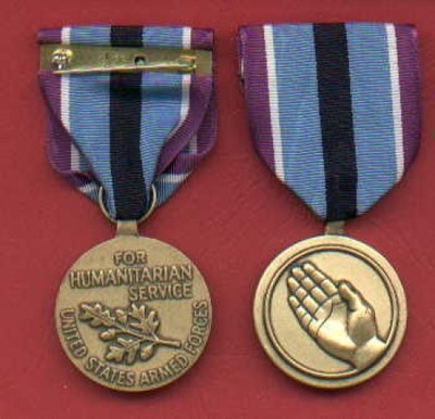 Humanitarian Service full size award medal with ribbon bar showing ...