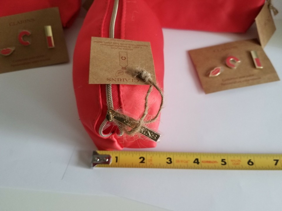 CLARINS PINK COSMETIC TRAVEL BAG WITH CLARINS LOGO PINS . BUY 1,2 OR 3 ...