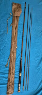 A EARLY VINTAGE 10FT 3 PIECE FLY ROD WITH 2 TIPS IN AGE RELATED CLOTH ...