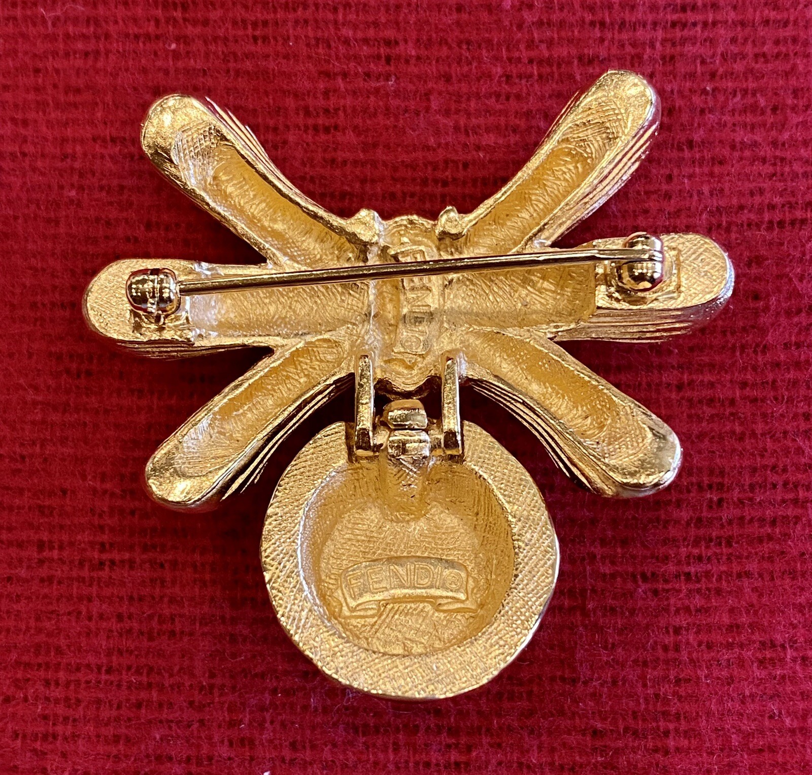 VINTAGE FENDI DANGLE GOLD PLATED ENAMEL BROOCH - Gem